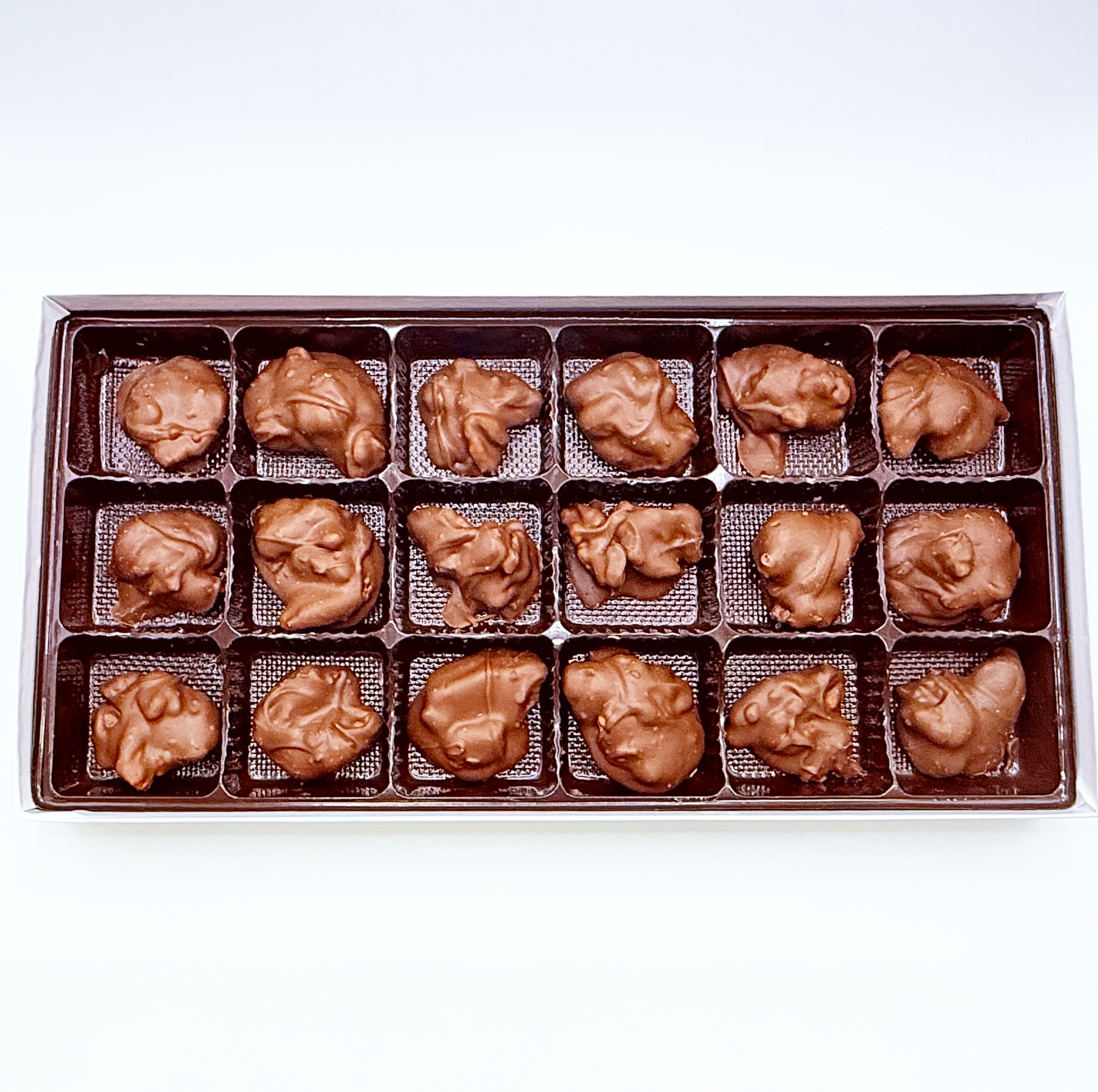 Walnut Clusters | Clark Candies, Inc.